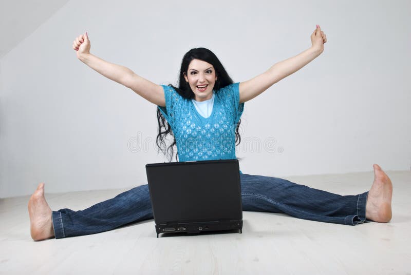 Excited woman using laptop stock photo. Image of black - 13939510