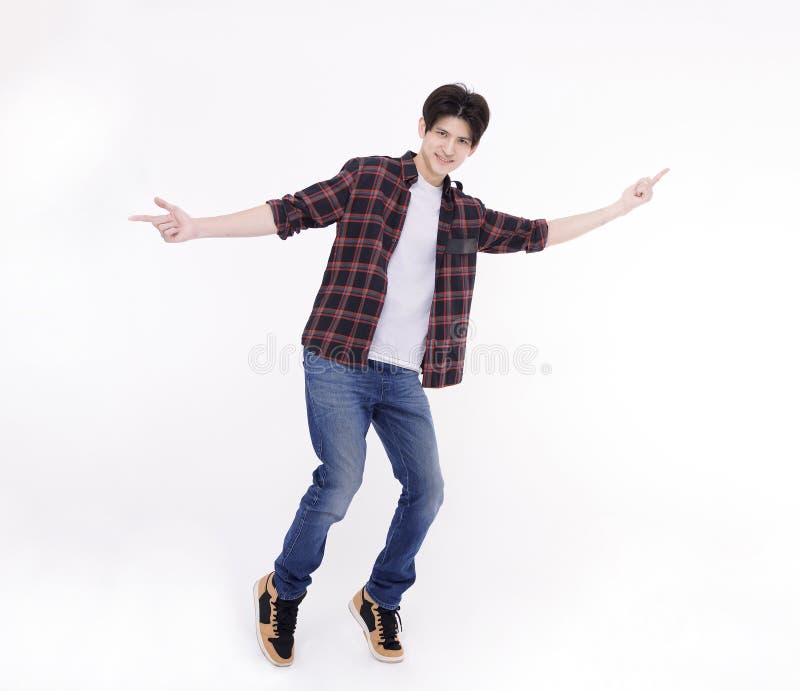 Excited Young Man Dancing and Jumping Isolated on White Stock Photo ...