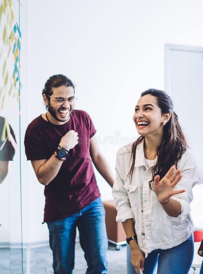 Excited Young Students Collaborating on Project Stock Image - Image of ...