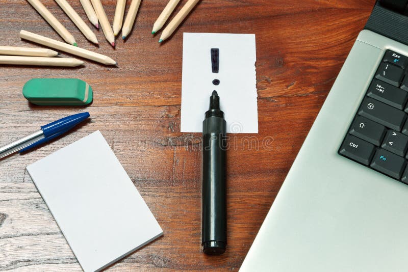 Exclamation Mark Over a Black Pen on Writing Desk Stock Photo - Image ...