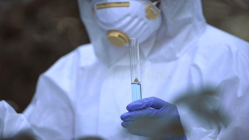 Exclusion Zone Researcher Analyzing Water Sample, Biological Hazard ...