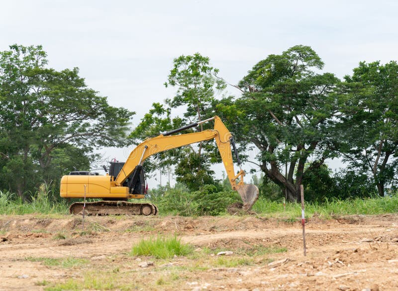 Excuvator Adjusting Ground Level Stock Photo - Image of bulldozer ...