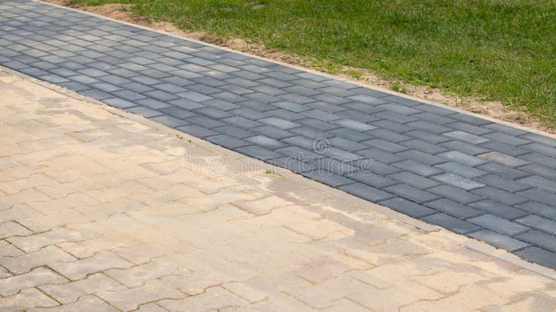 Execution of the Paving Stone Surface and Leveling. Stock Image - Image ...