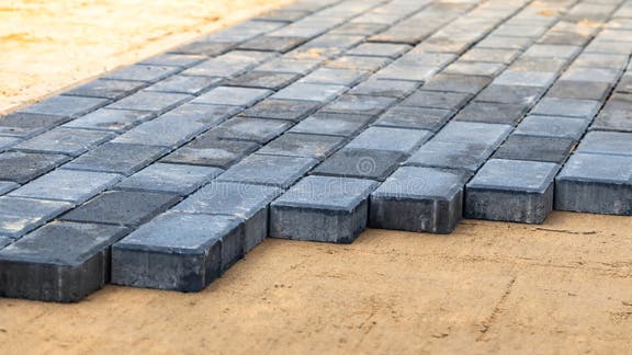Execution of the Paving Stone Surface and Leveling. Stock Photo - Image ...