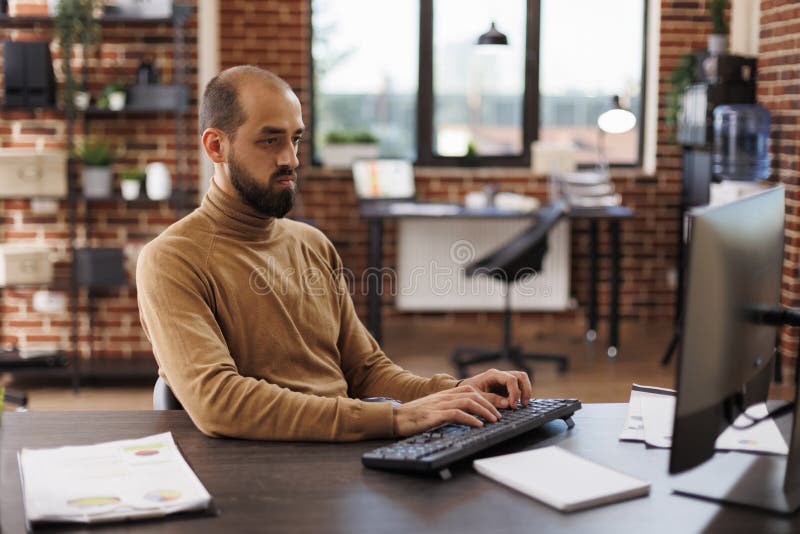 Executive Assistant Developing Accounting Financial Documentation while ...