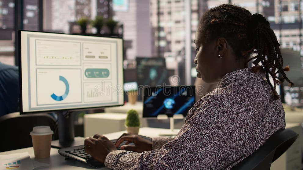 Executive Assistant in High End Office Works on Infographics Data ...