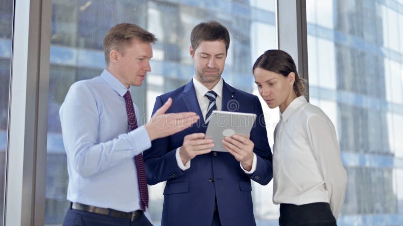 Executive Business People Using Tablet at Work Stock Image - Image of ...