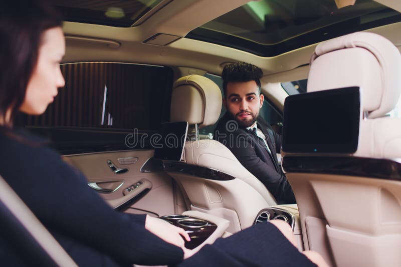 Executive Businesswoman in Car Work on Her Laptop. Stock Photo - Image ...