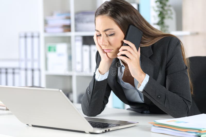 Executive Calling on Phone Waiting on Hold at Office Stock Photo ...