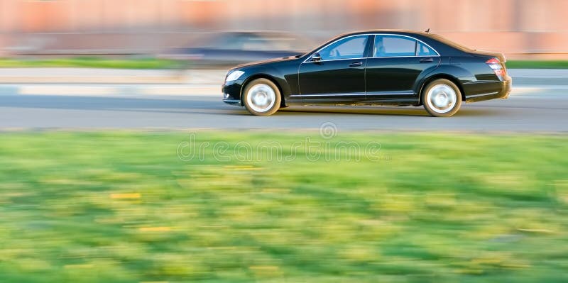 Fast moving red car stock photo. Image of camera, joyride - 2511276