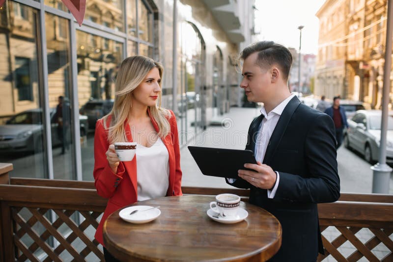 Executive Co-workers Remote Work are Coffee Break Outdoors. Successful ...