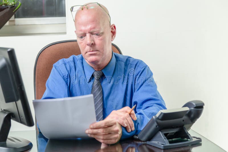 Executive Comparing Computer and Written Notes Stock Image - Image of ...