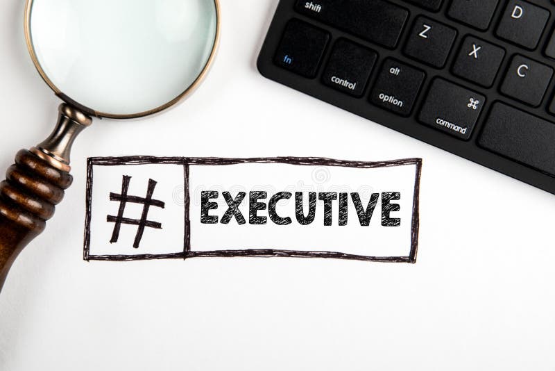 Executive. Computer Keyboard and Magnifying Glass on the Office Table ...