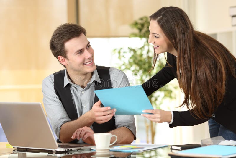 Executive Giving Documents To a Businessman Stock Image - Image of ...