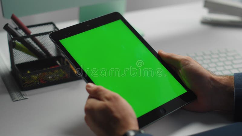 Executive Hold Green Tablet Device at Workplace. Freelancer Talk Job ...