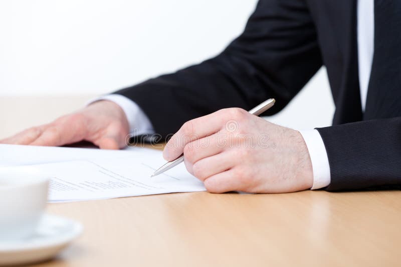 Executive Making Notes in the Writing Pad Stock Photo - Image of ...