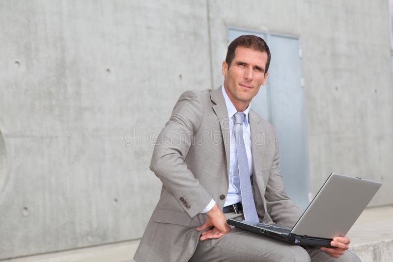 Happy Executive Man Looking a Laptop Computer with Arms Raised I Stock ...