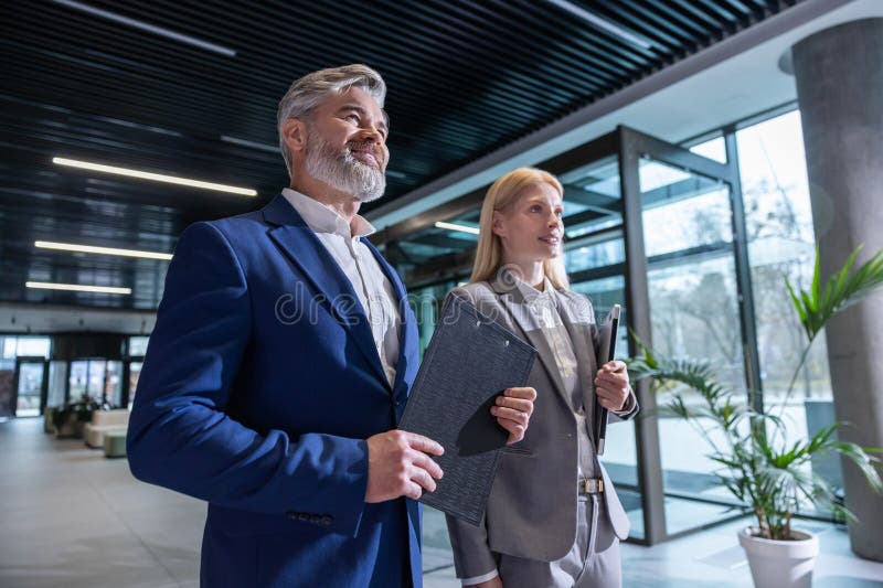 Executive Manager and Colleagues Having Professional Conversation about ...