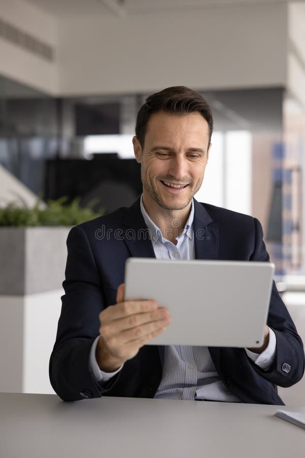 Executive Manager Reviewing Electronic Services Using Management Apps ...