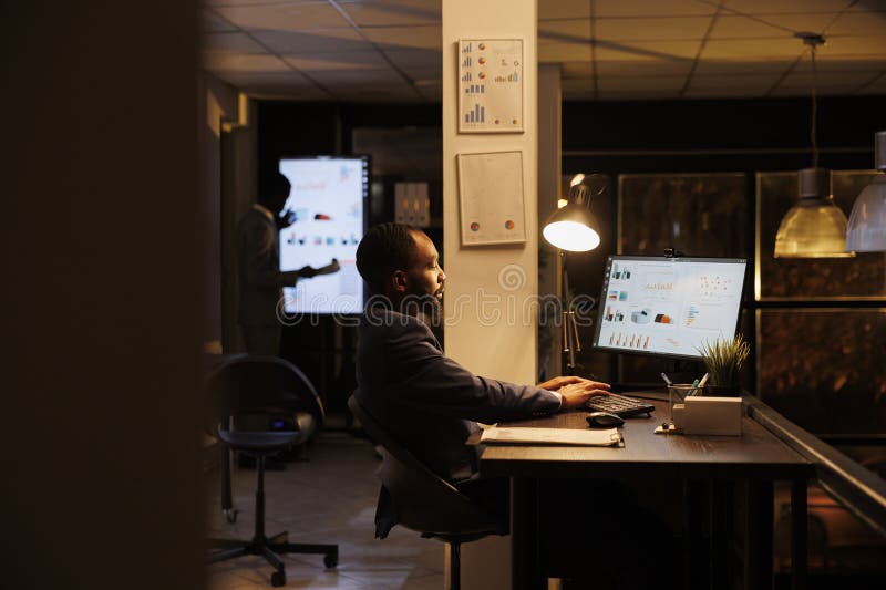 Executive Manager Sitting at Desk Table in Startup Office Stock Photo ...
