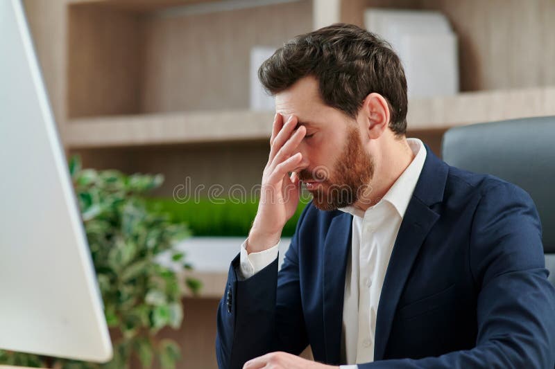 An Executive or an Office Worker Closing His Eyes from the Tiredness ...