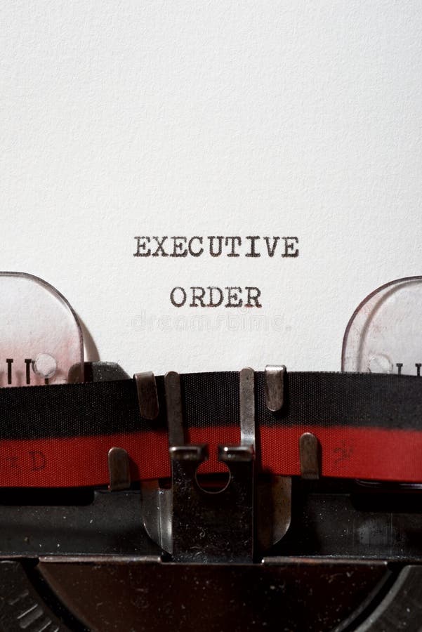 EXECUTIVE ORDER Text on Notebook with Chart, Calculator and Pen Stock ...