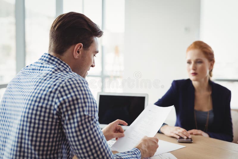 Executive Reading Document at Desk Stock Image - Image of communication ...