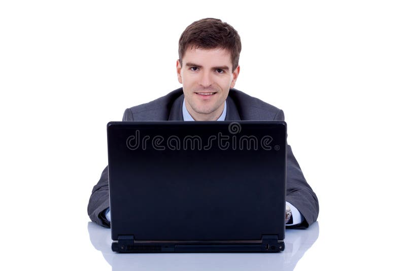 Executive in Suit Behind Desk with Laptop Stock Photo - Image of color ...