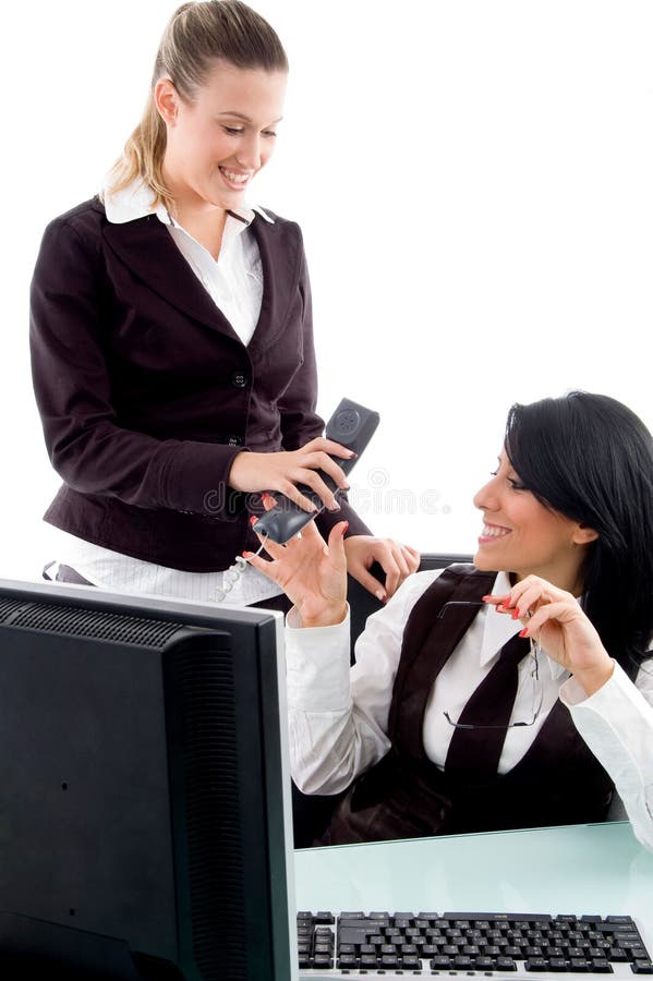 Executive Taking Phone Receiver from Her Secretary Stock Image - Image ...