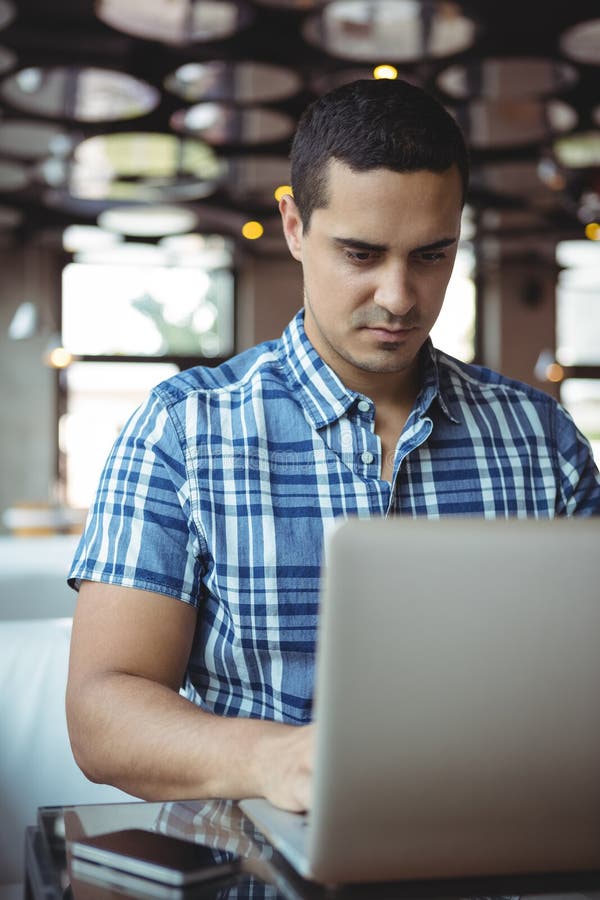 Attentive Executive Using Laptop at Desk Stock Image - Image of ...