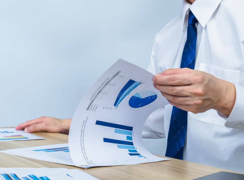 Executive Work with Data Graph on Document on Working Desk Stock Photo ...