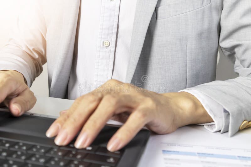 Executives Check Work and Enter Work Data Via Laptops Stock Photo ...