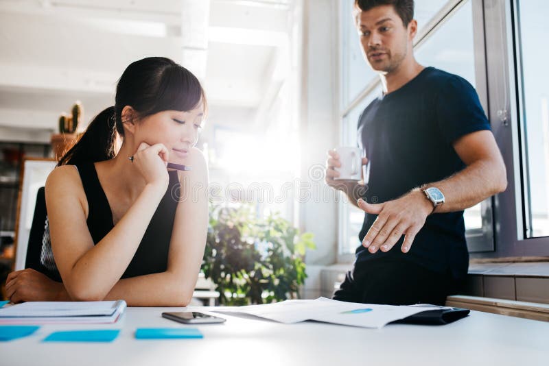 Executives Discussing New Business Ideas in Office Stock Photo - Image ...