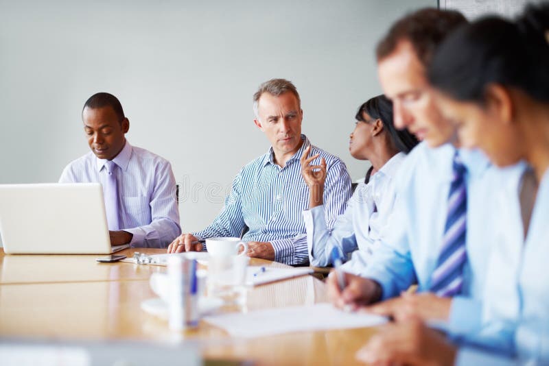 Executives in Discussion before Meeting. Executives in Board Room for ...