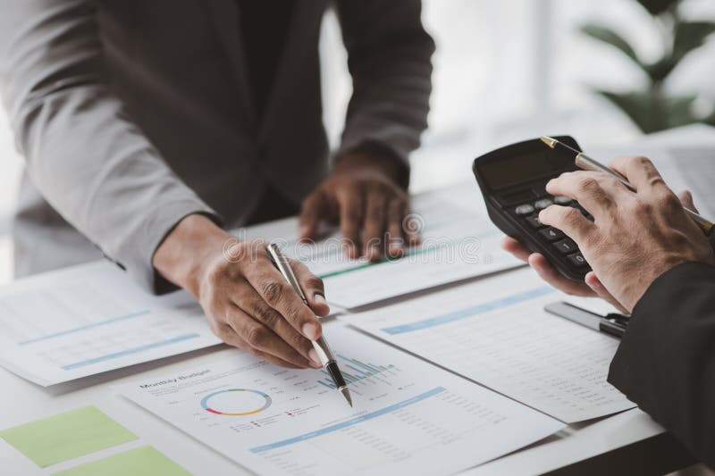 Executives and Managers are Meeting in a Conference Room, on the Table ...