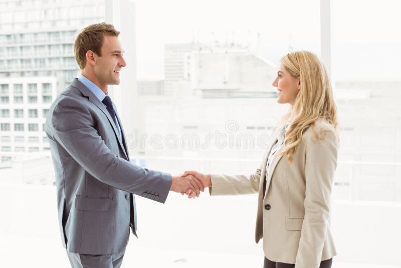 Executives Shaking Hands in Office Stock Image - Image of team ...