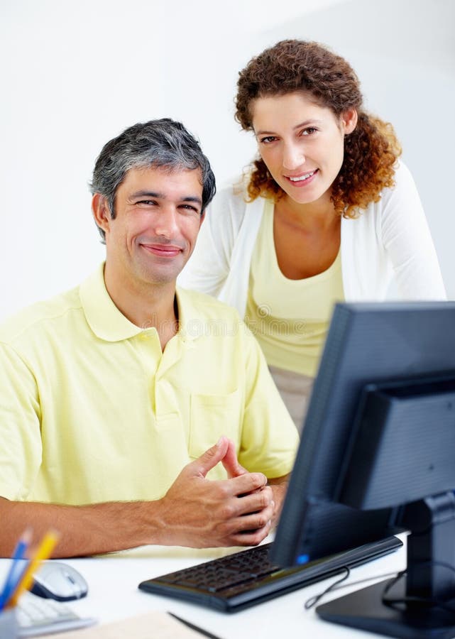 Executives Smiling. Portrait of Male and Female Executives Smiling at ...