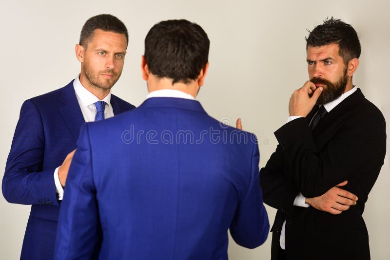 Executives Trying To Find Compromise On Light Grey Background. Stock ...