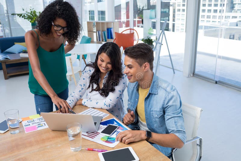 Executives Working on Laptop in the Office Stock Photo - Image of ...