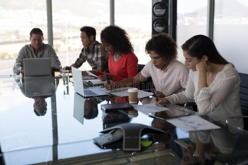Executives Working at Table in Office Stock Image - Image of 2024 ...