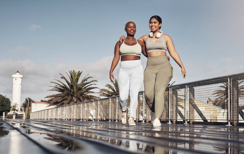 Exercise is Better with a Friend. Two Young Women Out for a Run ...