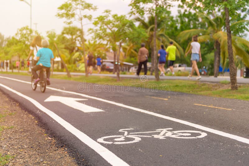 Exercise with Bicycle in Public Park, Outdoor Sport Stock Photo - Image ...