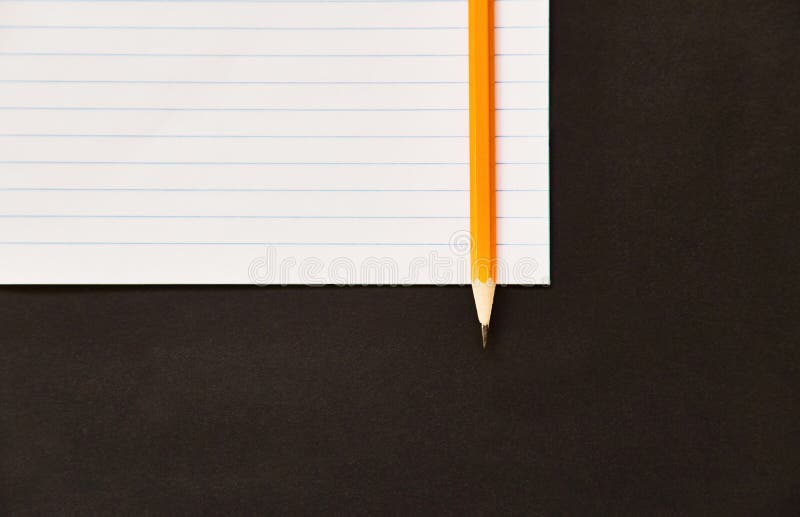Exercise book with pencil. stock photo. Image of design - 129998708