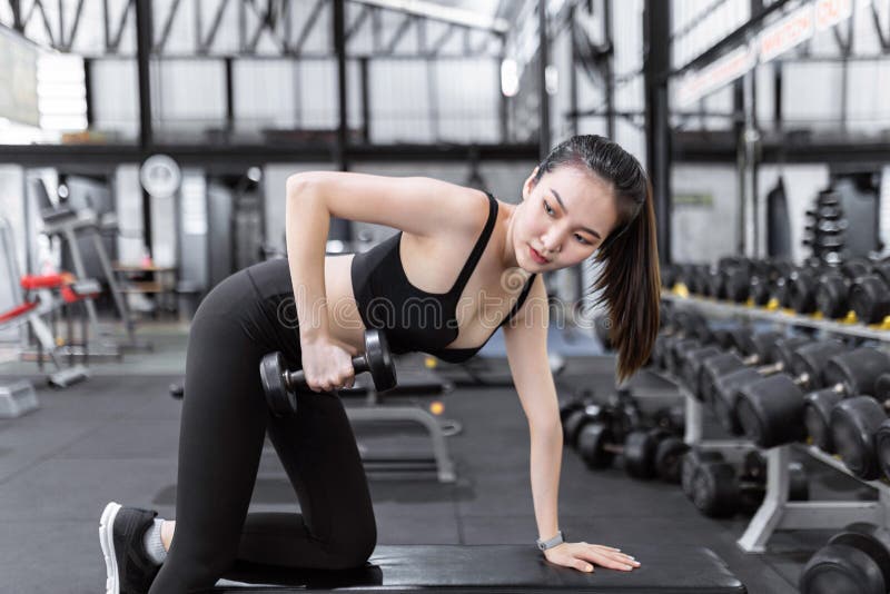 Exercise Concept the Female Exercise Beginner Doing Dumbbell Workout by ...