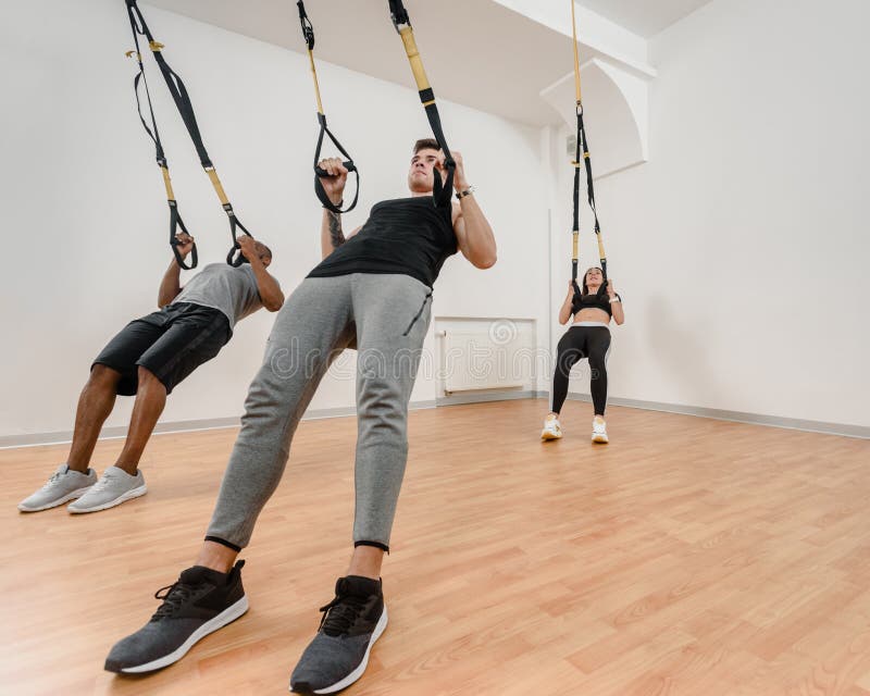 Exercise with elastic rope stock photo. Image of cross - 218394906