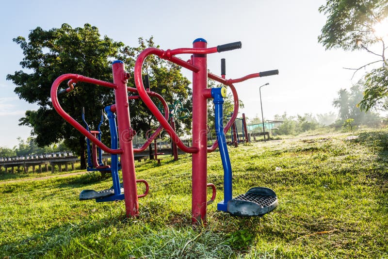 Exercise Equipment in Public Park on Sunrise. Stock Photo - Image of ...