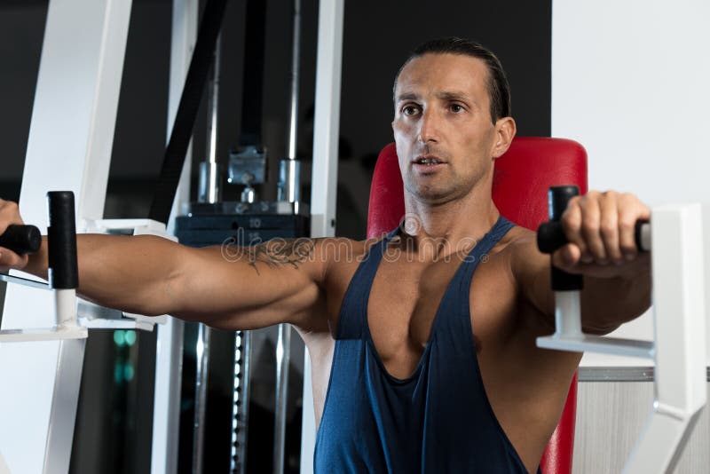 Exercise Machine For Chest stock image. Image of effort - 34167627