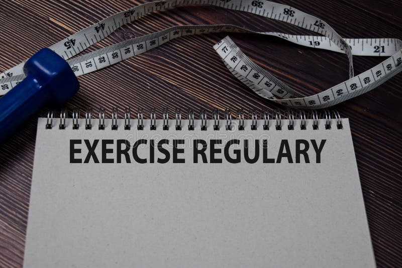Exercise Regularly Write on a Book on Wooden Table Stock Image - Image ...