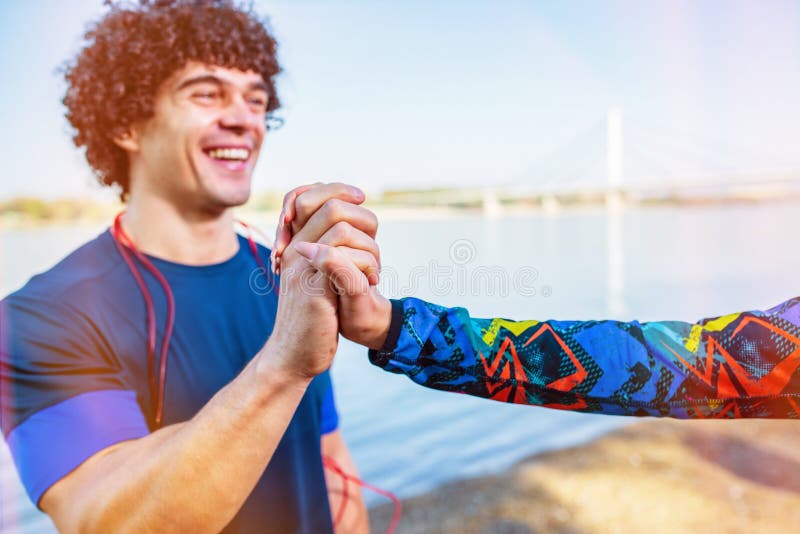 Exercise - Couple Giving High Five To Each Other after Workout Stock ...