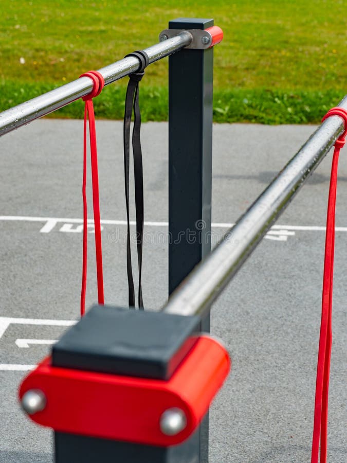 Exercise and Stretching Rubber Elastic Bands Hanging on a Workout Rail ...